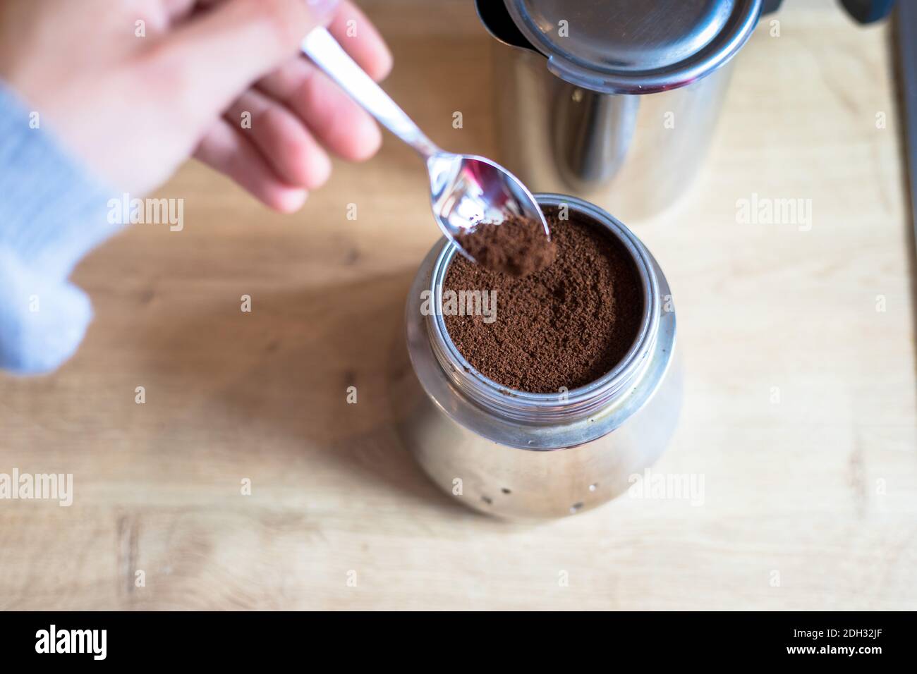 Preparing fresh coffee with a vintage steal coffee cooker Stock Photo ...
