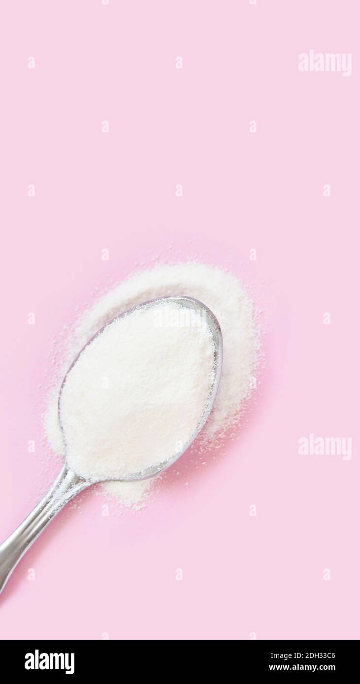 Collagen white powder. Pastel color background. Health product Stock ...