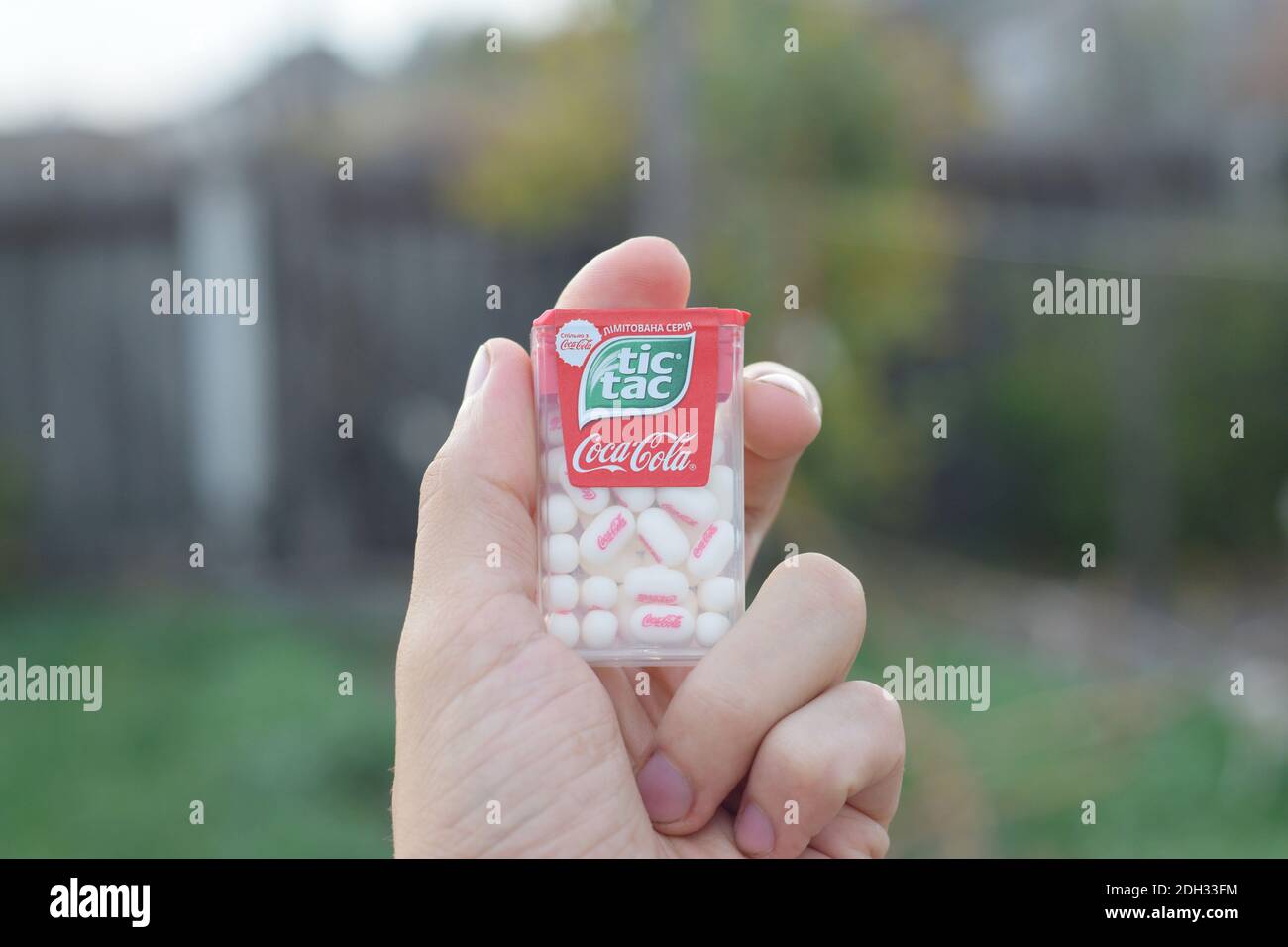 KHARKOV, UKRAINE - OCTOBER 17, 2020: Tic Tac Candy package with Coca ...