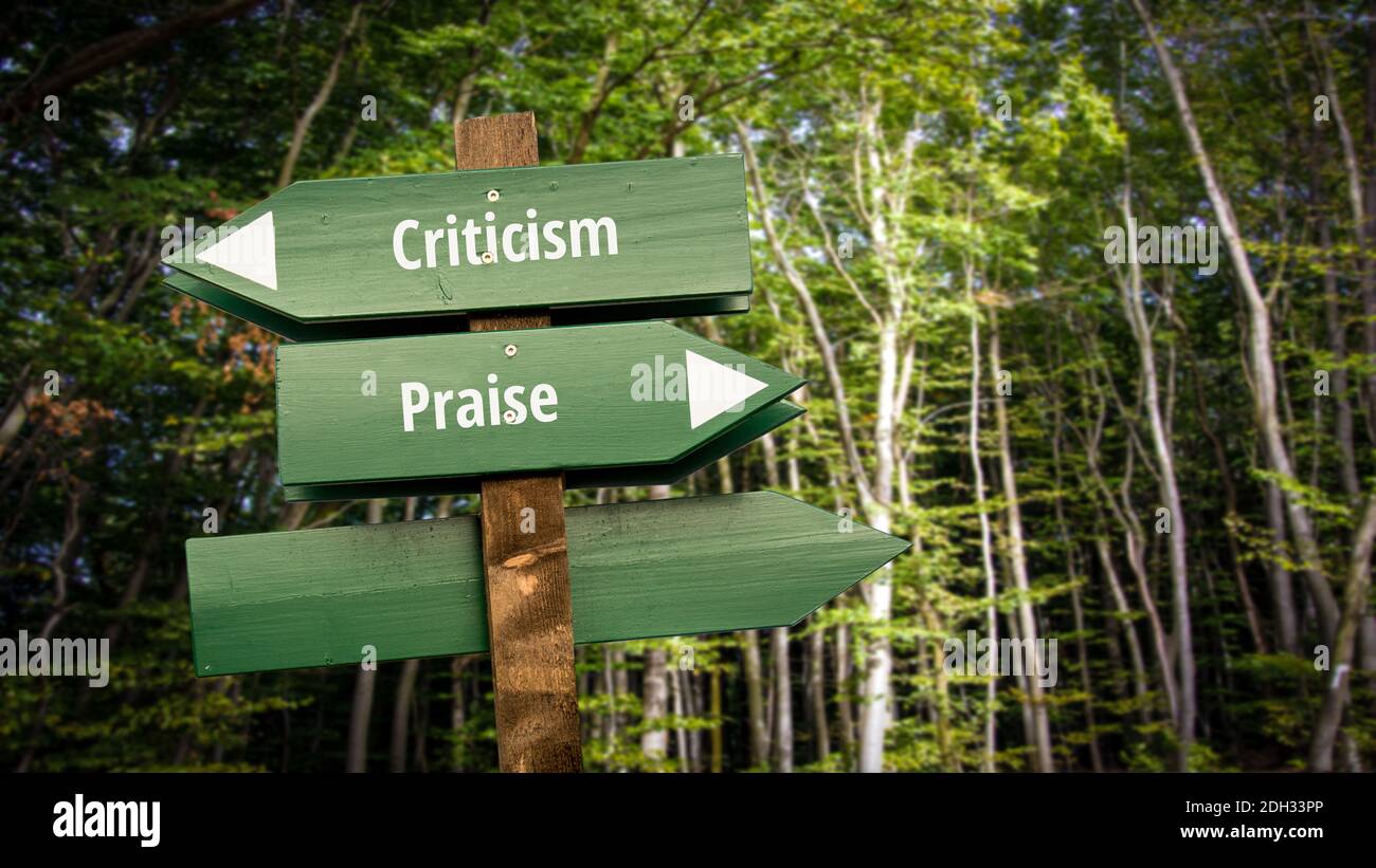 Street Sign Praise versus Criticism Stock Photo - Alamy