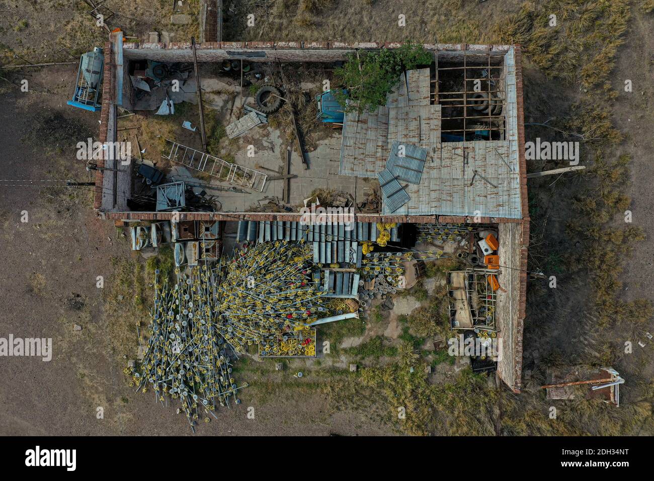 Aerial view of old, abandoned and dilapidated house on a vacant lot ...
