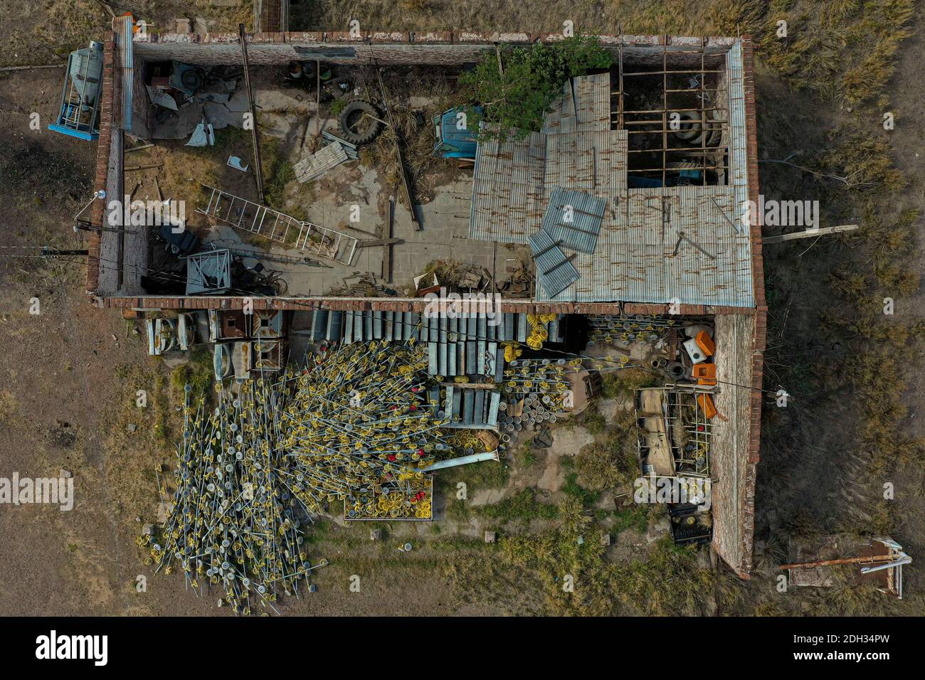 Aerial view of old, abandoned and dilapidated house on a vacant lot ...