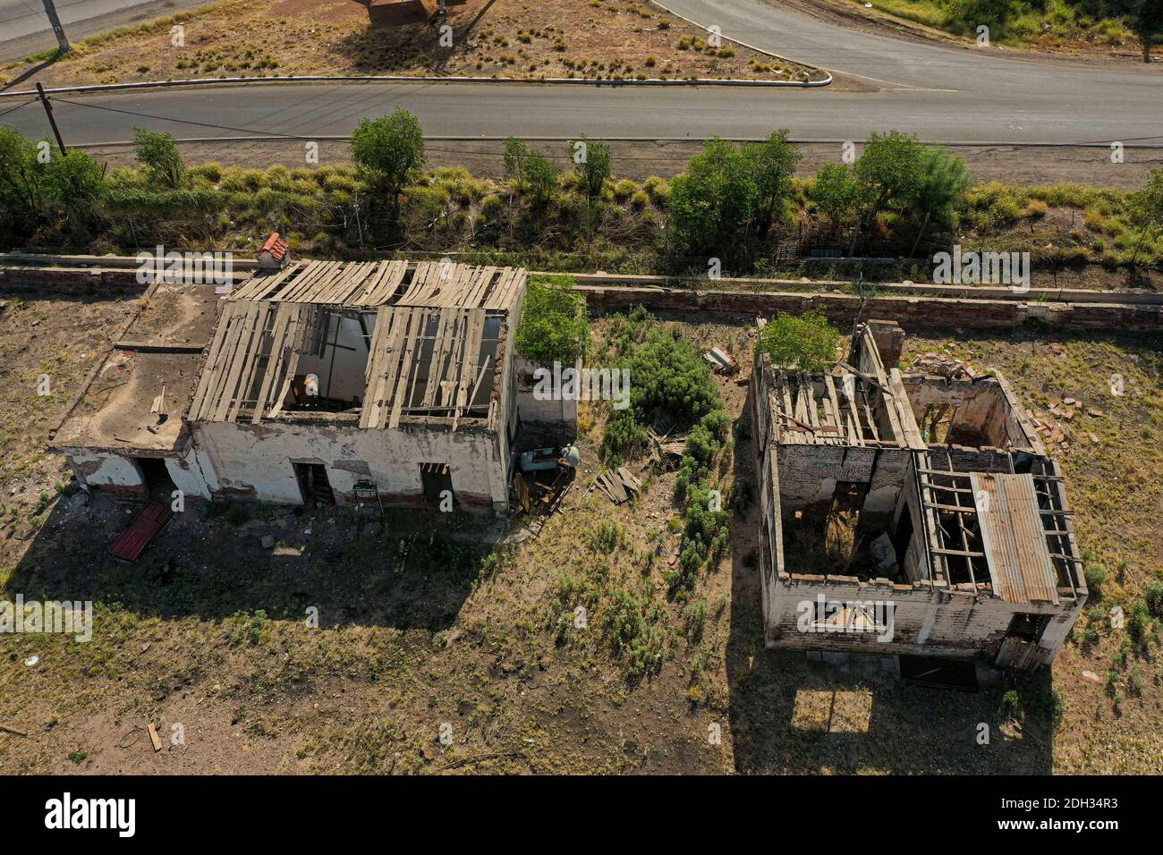Aerial view of old, abandoned and dilapidated house on a vacant lot ...