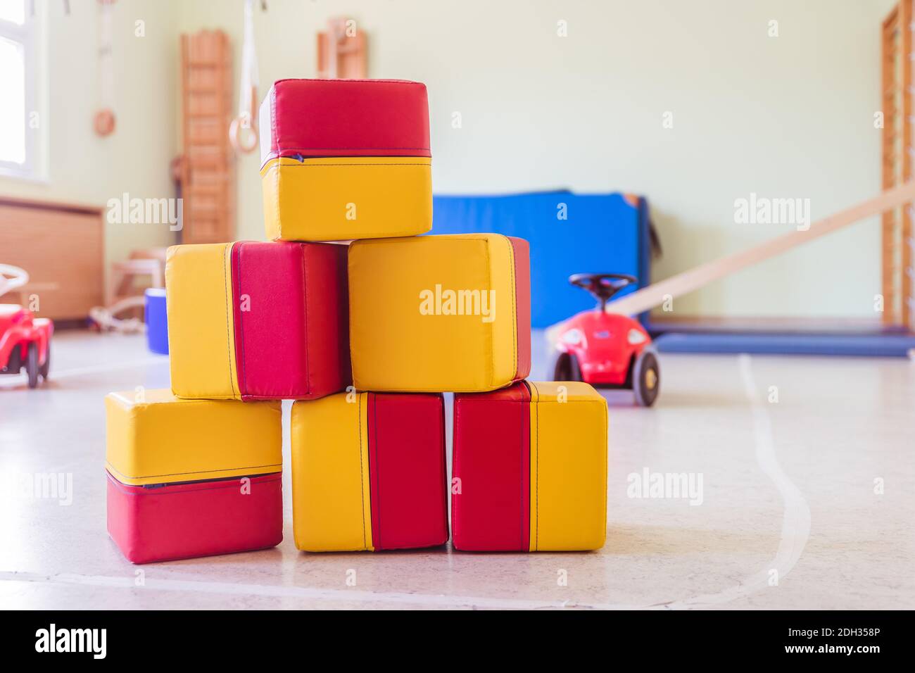 Toy foam cubes in gym hall of a pre school Stock Photo - Alamy