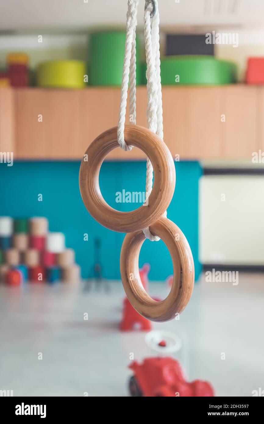 Physical education concept: Gym rings in gym hall of Kindergarten Stock ...