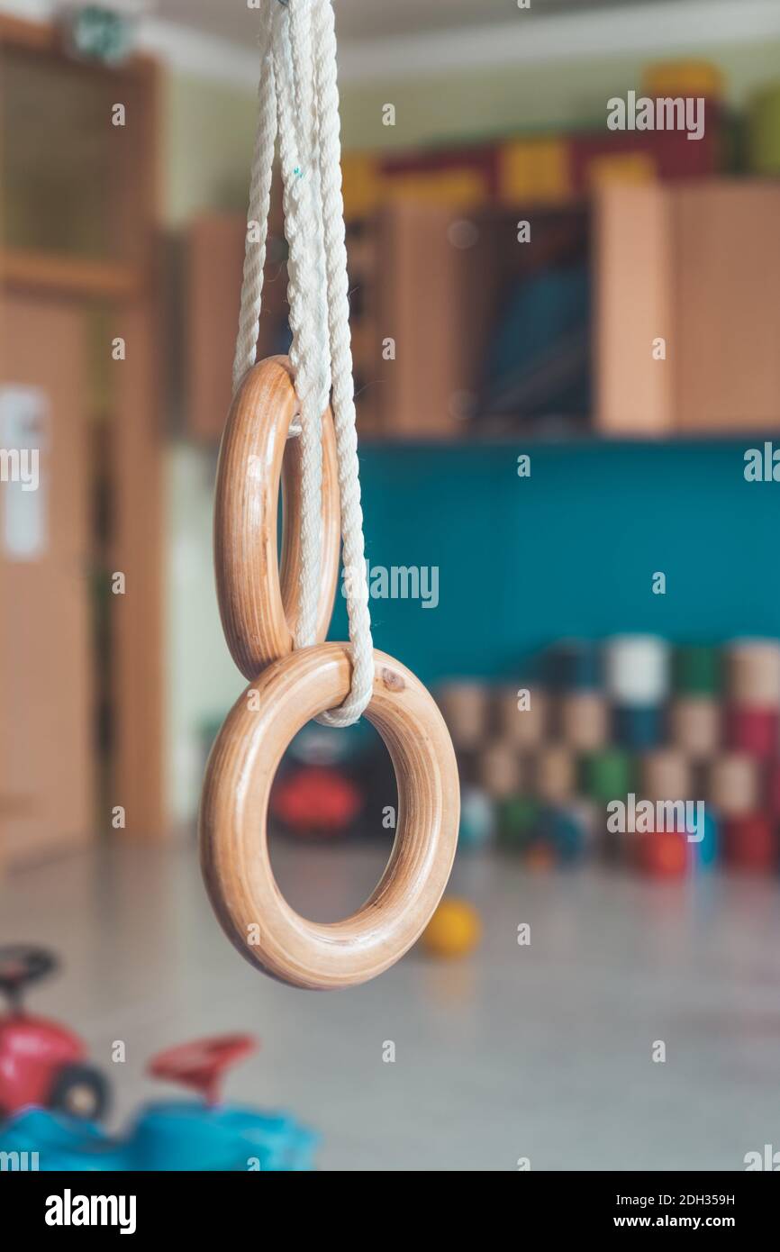 Physical education concept: Gym rings in gym hall of Kindergarten Stock ...