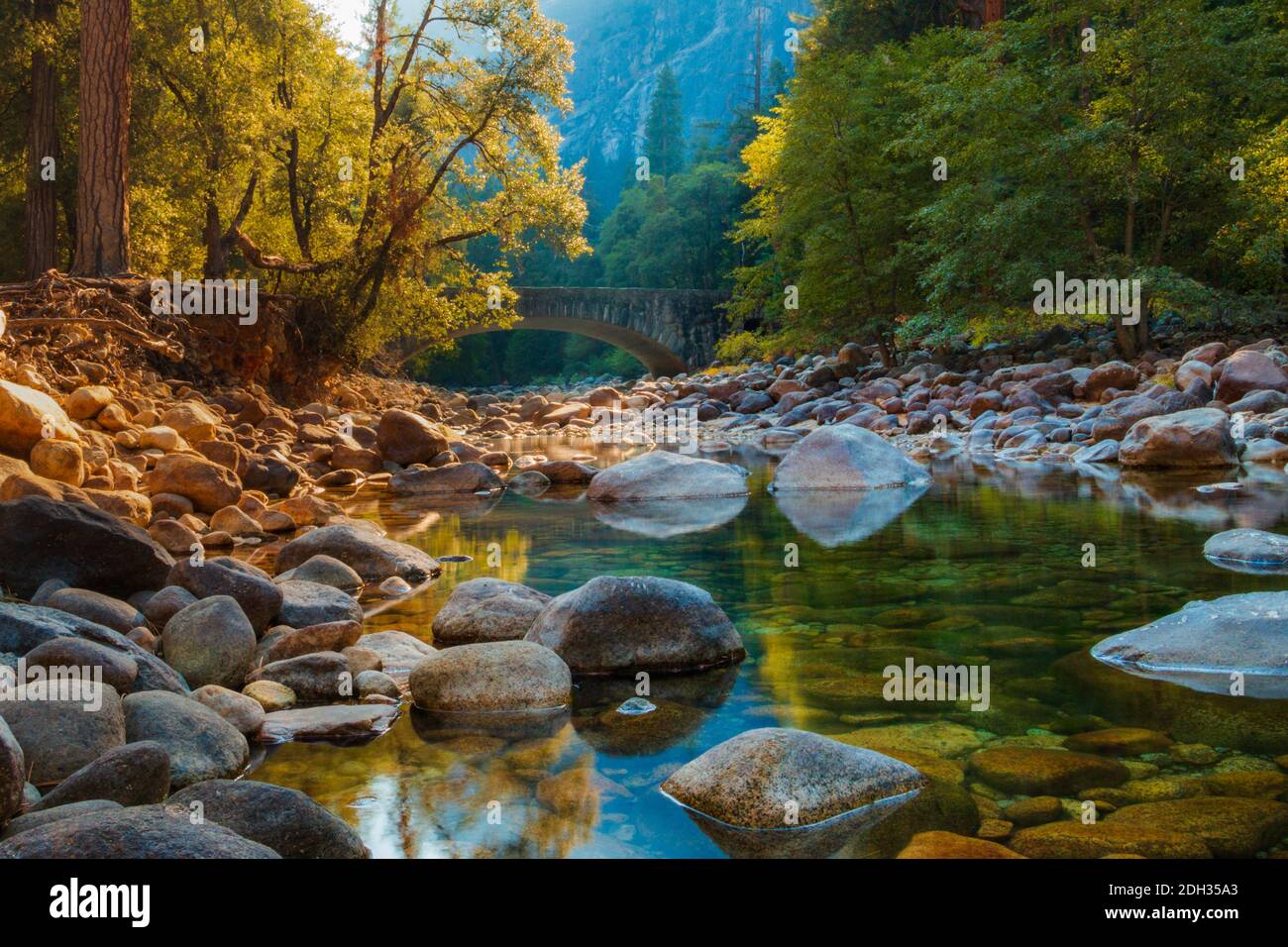 A creek with rocks and trees in Yosemite Stock Photo - Alamy