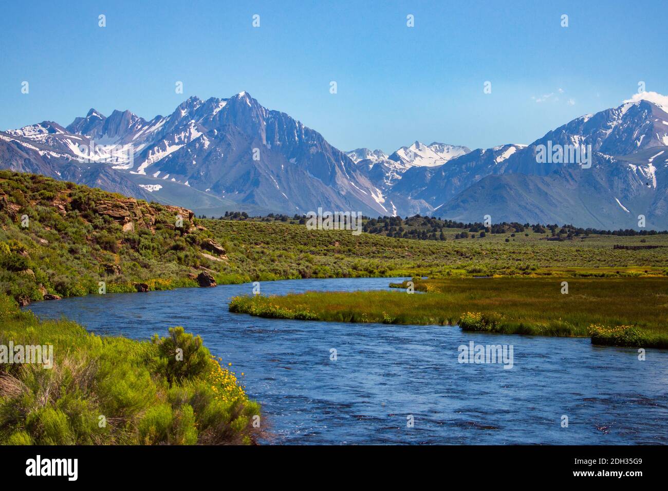 Snowy meadow with stream hi-res stock photography and images - Alamy