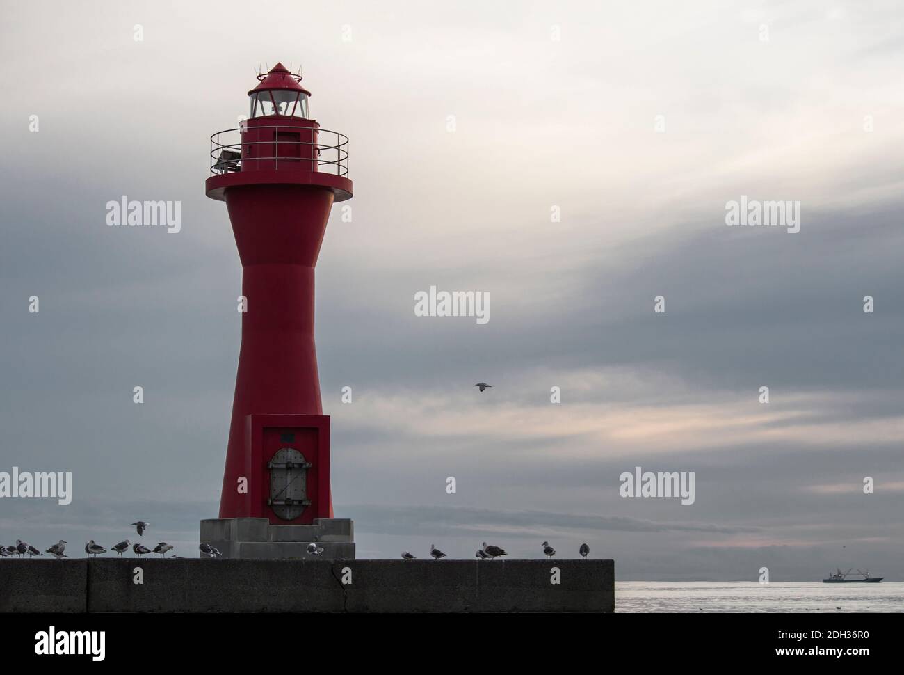 The dim sky at dusk and the lighthouse at Kushiro Port Stock Photo - Alamy