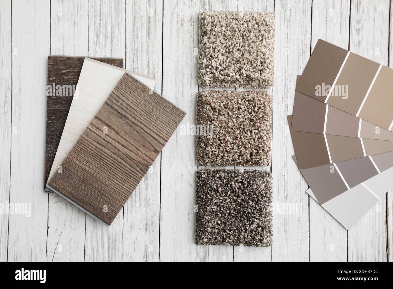 Selection of flooring and paint samples displayed for interior design ...