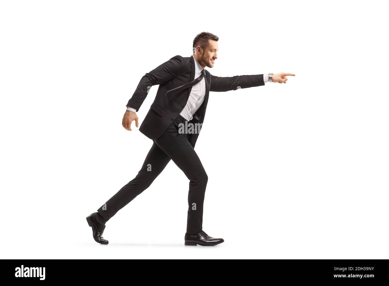 Businessman running and pointing forward isolated on white background ...