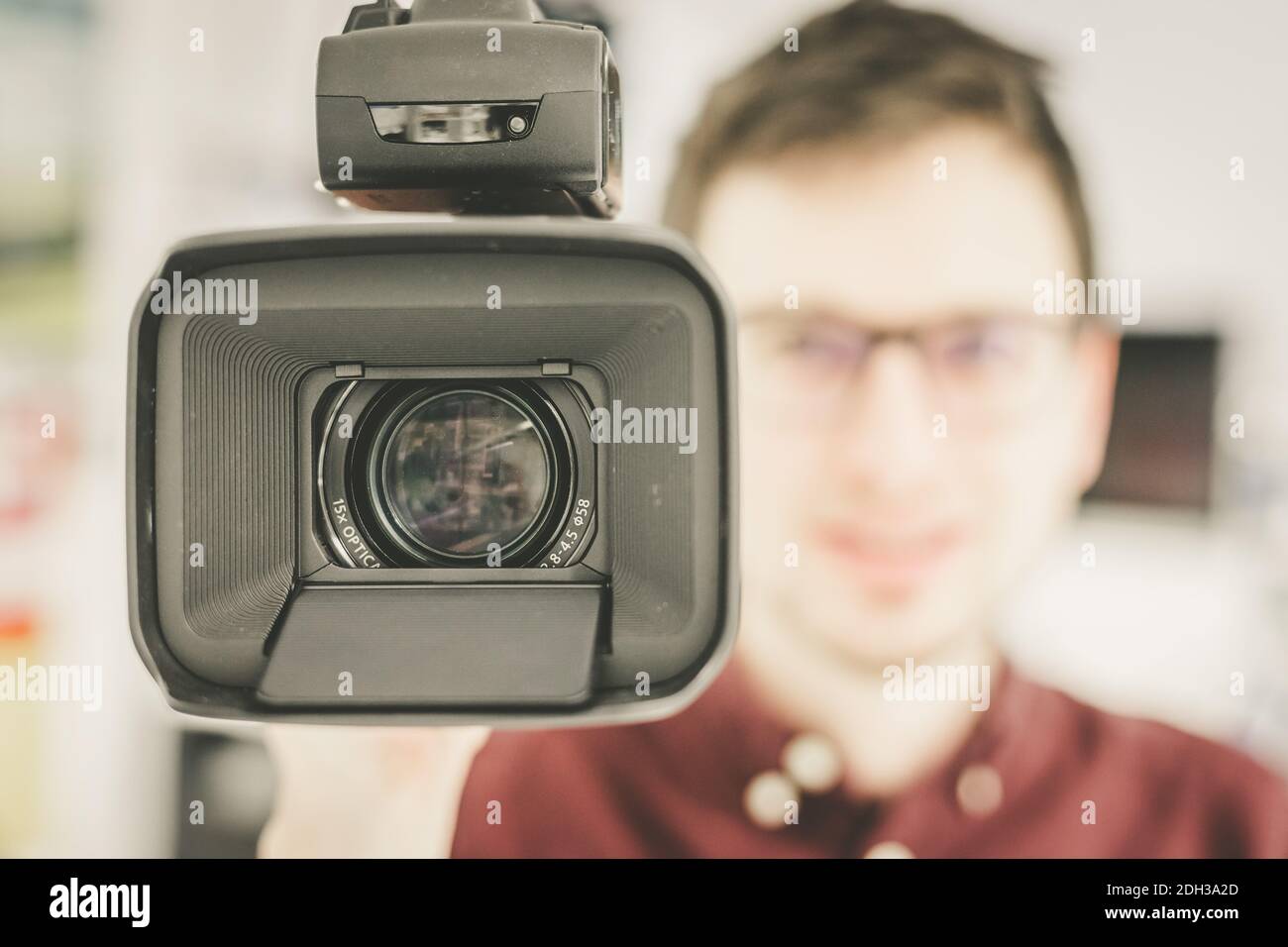 Professional film production: Male filmmaker is recording with a ...