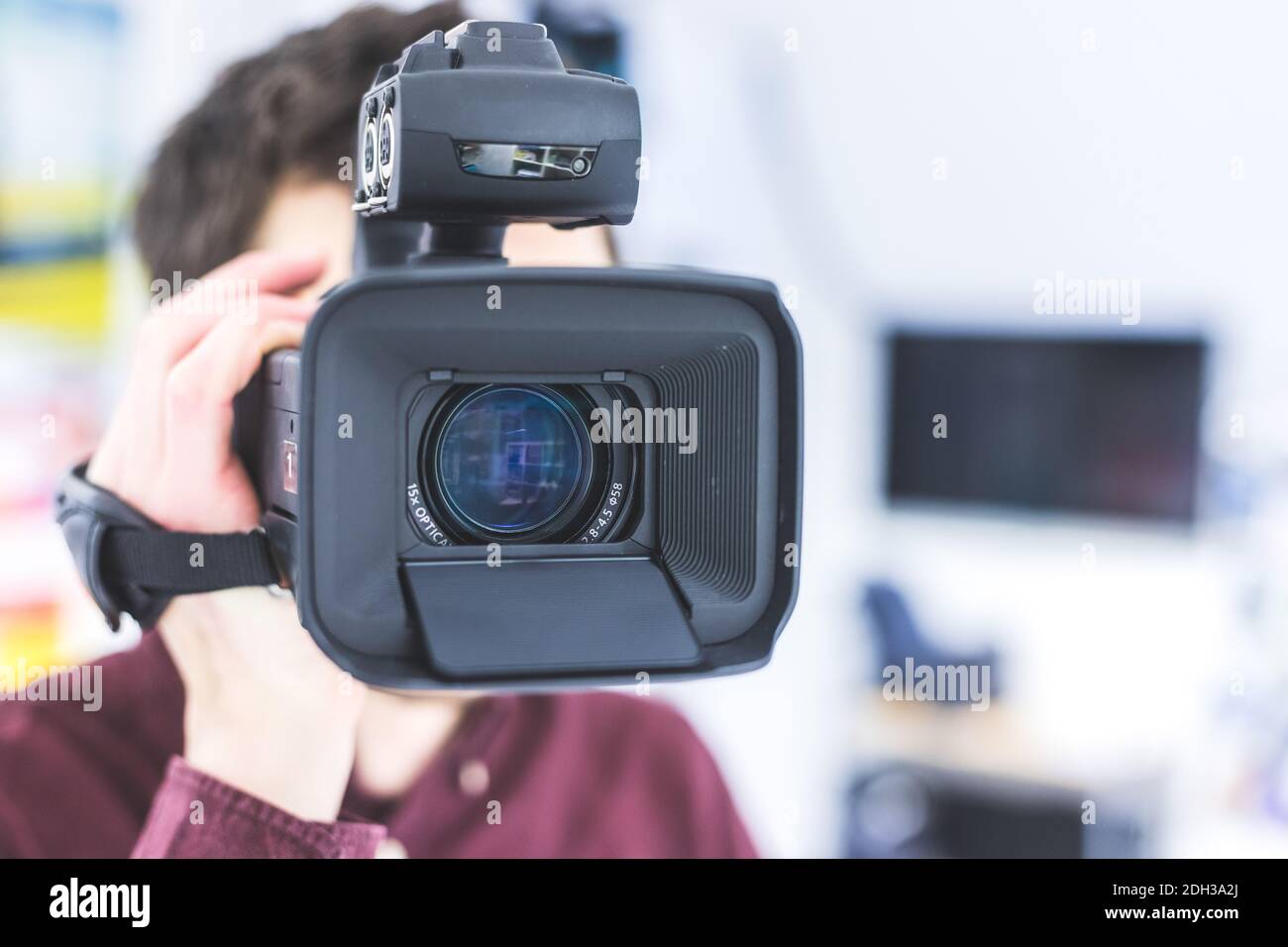 Professional film production: Male filmmaker is recording with a ...