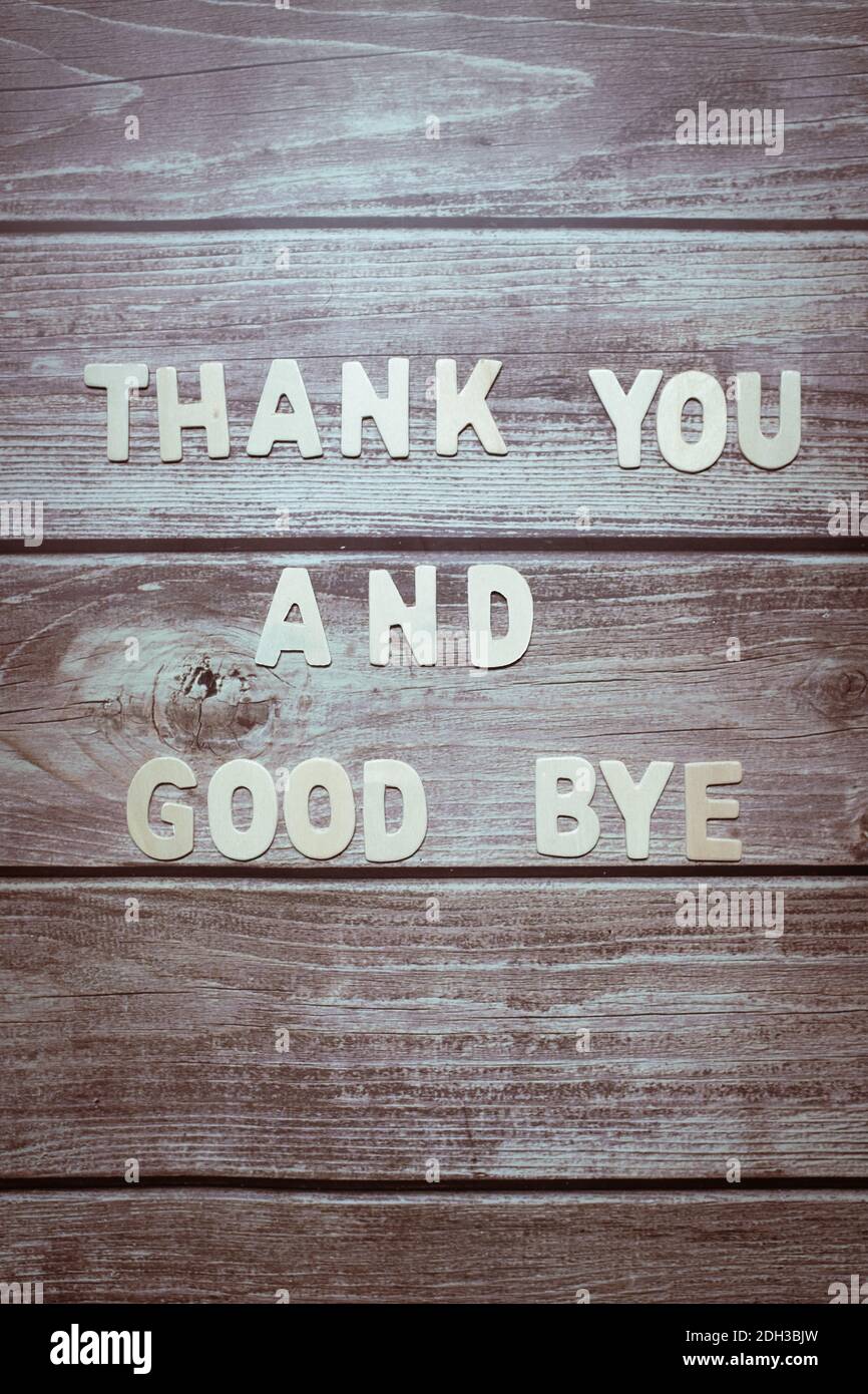 Thank you and good bye wooden words letter written on a wooden board ...