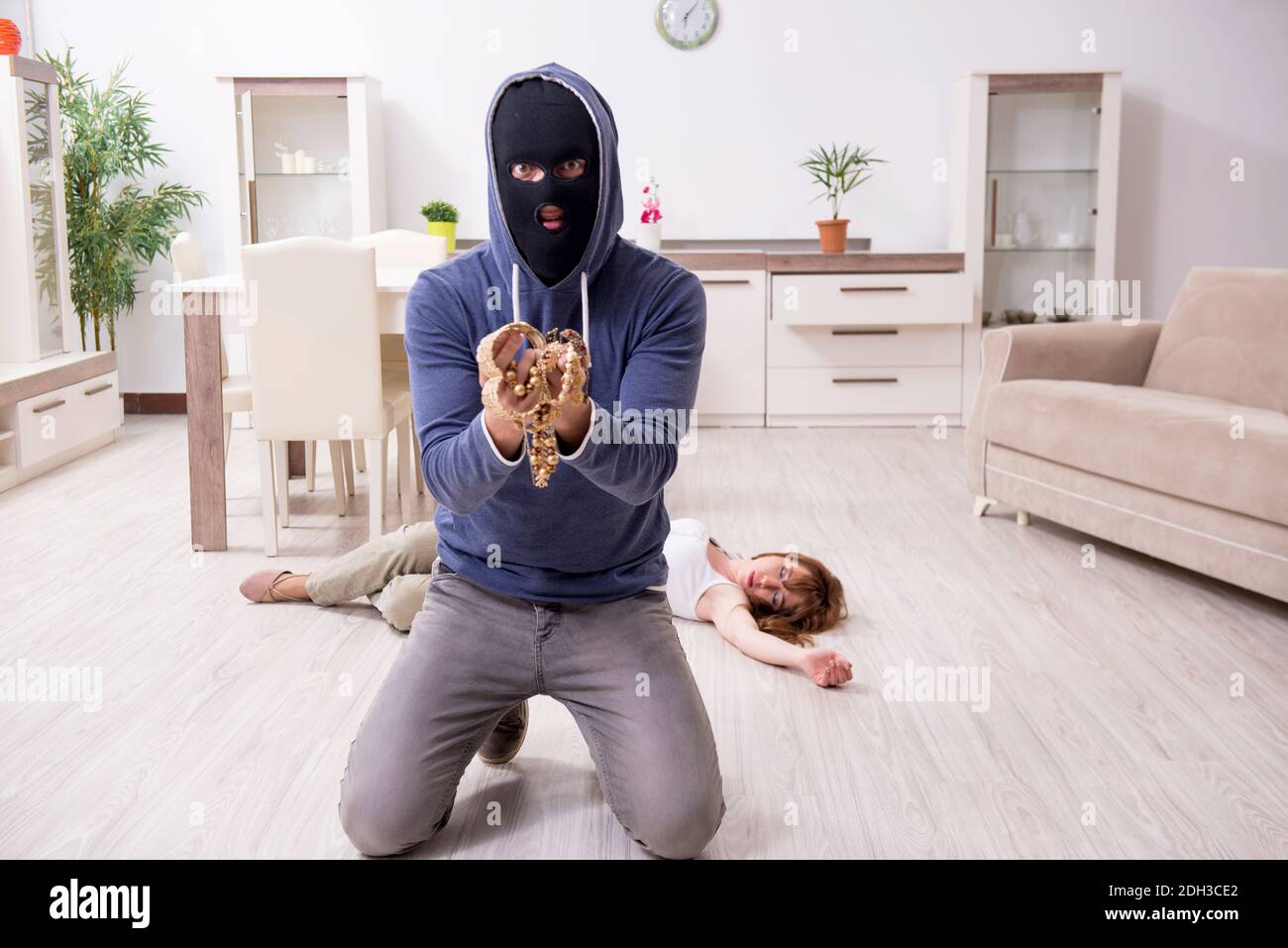 Young woman lying down dead hi-res stock photography and images - Alamy