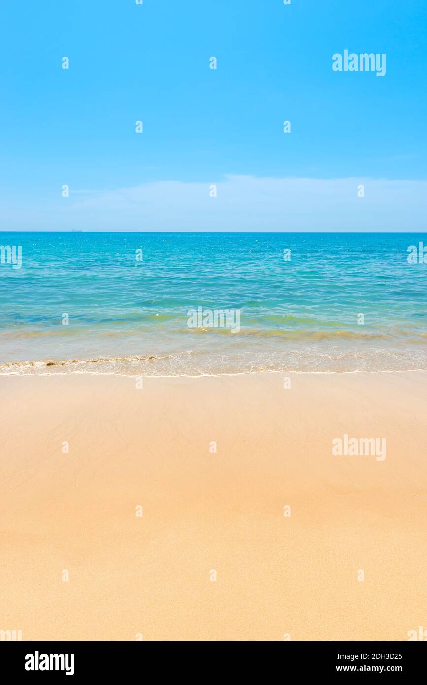 Blue sea water and sand beach Stock Photo - Alamy