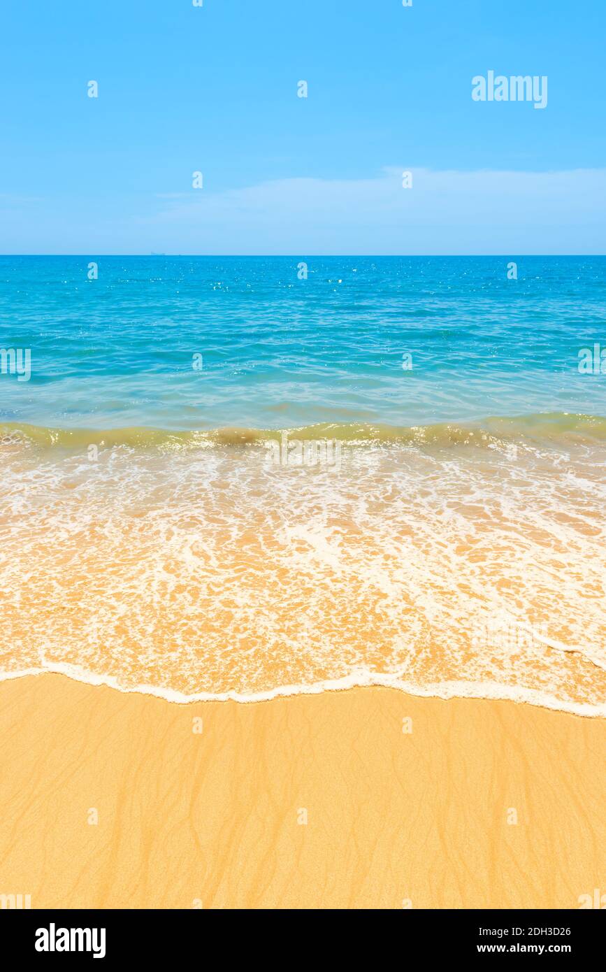 Blue sea water and sand beach Stock Photo - Alamy