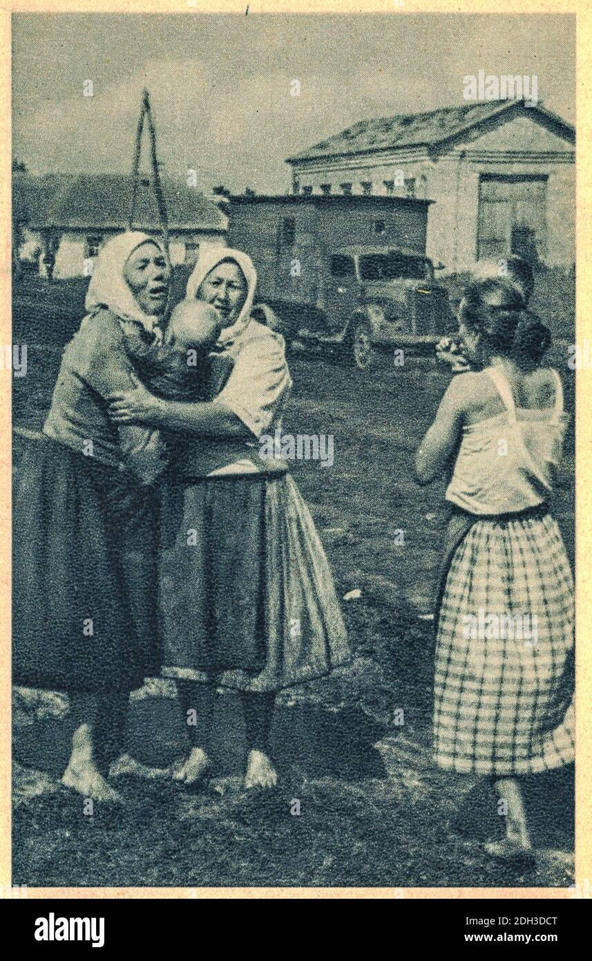 The victims of war. Crying women with children Stock Photo - Alamy