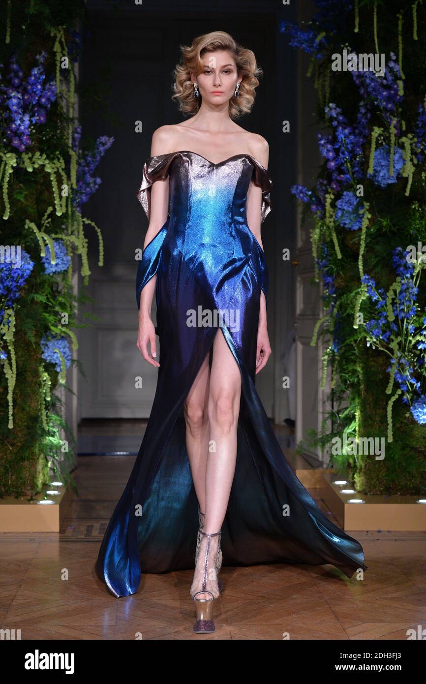 A model displays a creation designed by Guo Pei during the Guo Pei’s ...