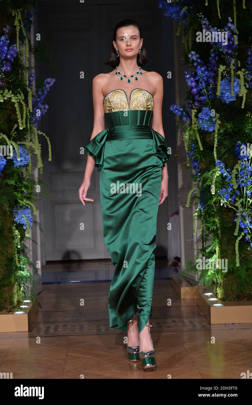 A model displays a creation designed by Guo Pei during the Guo Pei’s ...