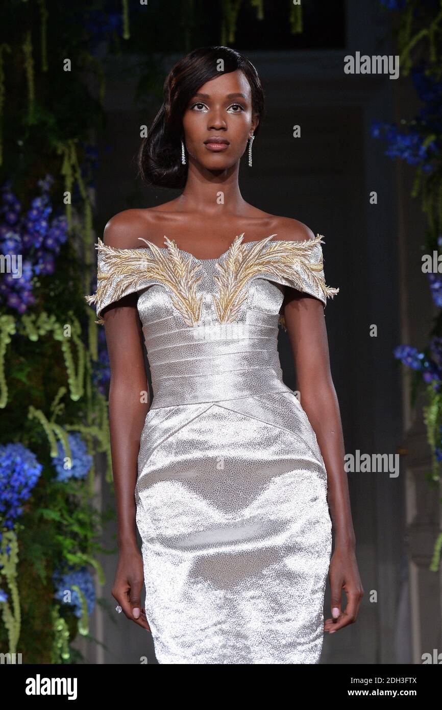 A model displays a creation designed by Guo Pei during the Guo Pei’s ...
