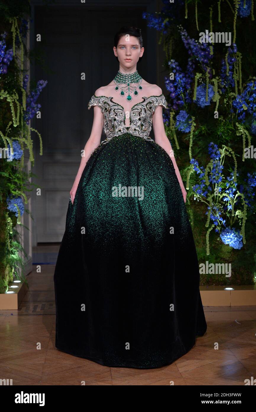 A model displays a creation designed by Guo Pei during the Guo Pei’s ...