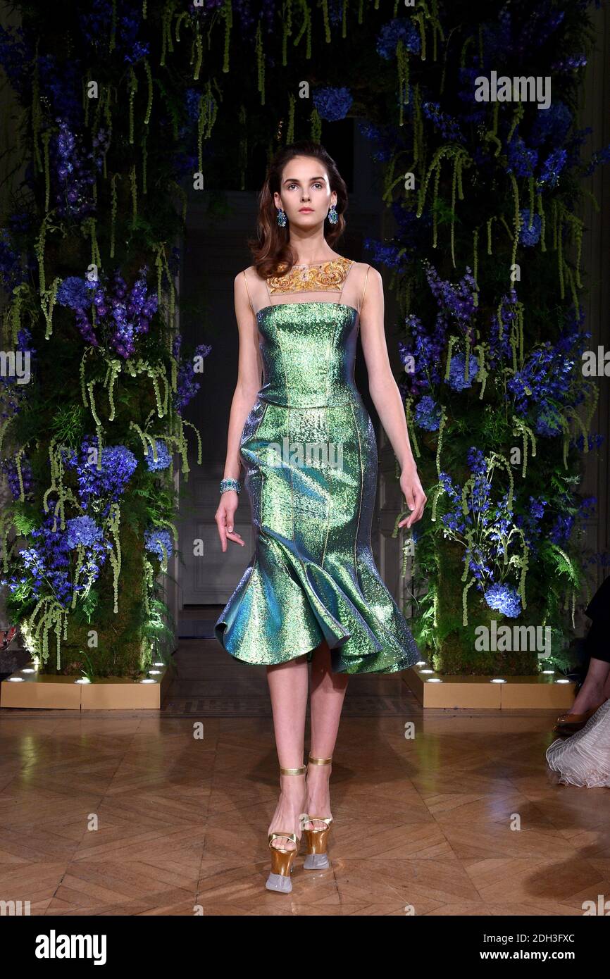 A model displays a creation designed by Guo Pei during the Guo Pei’s ...