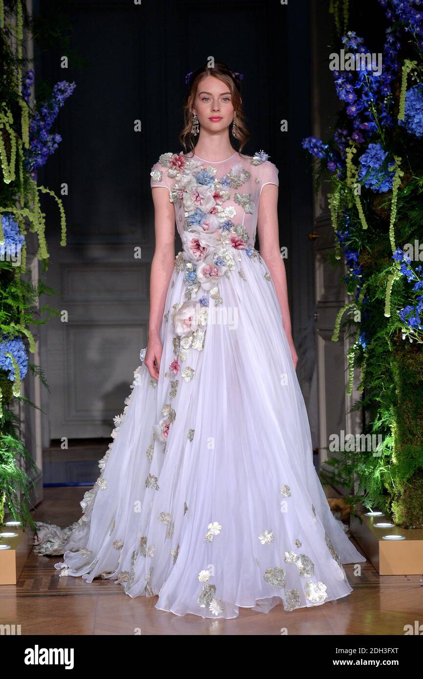 A model displays a creation designed by Guo Pei during the Guo Pei’s ...