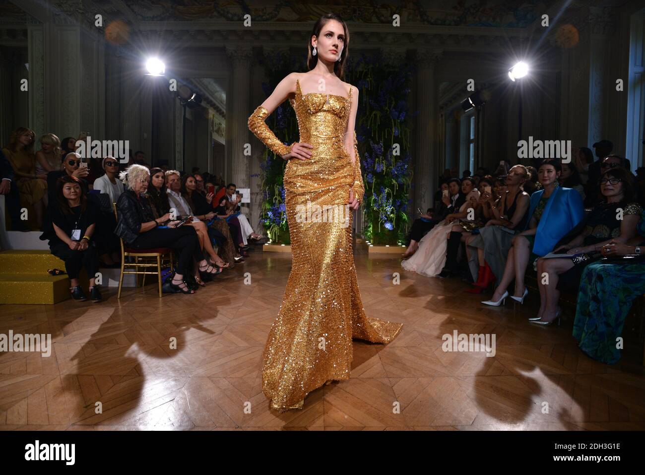 A model displays a creation designed by Guo Pei during the Guo Pei’s ...