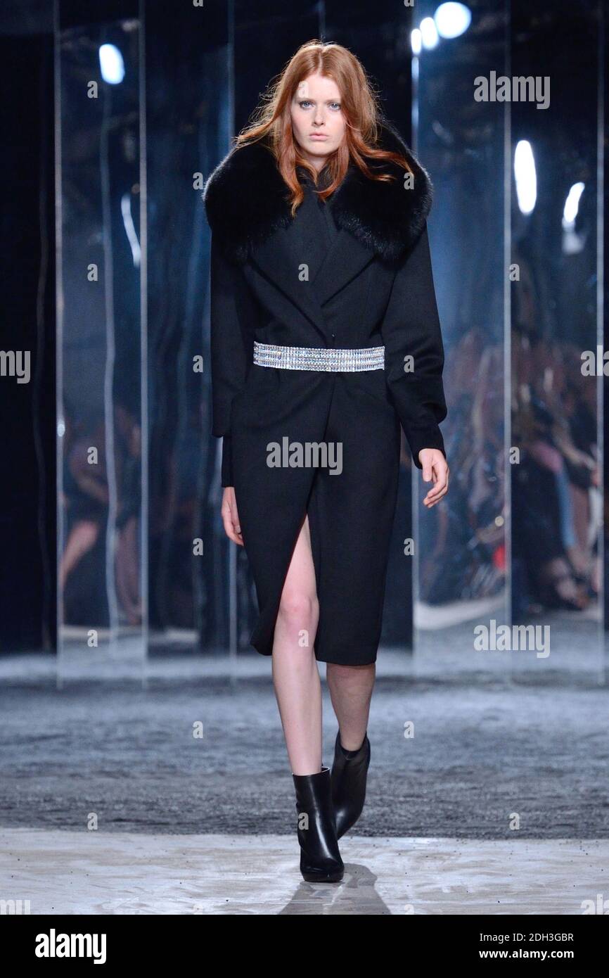 A model displays a creation on the runway during the Loris Azzaro 2017/ ...