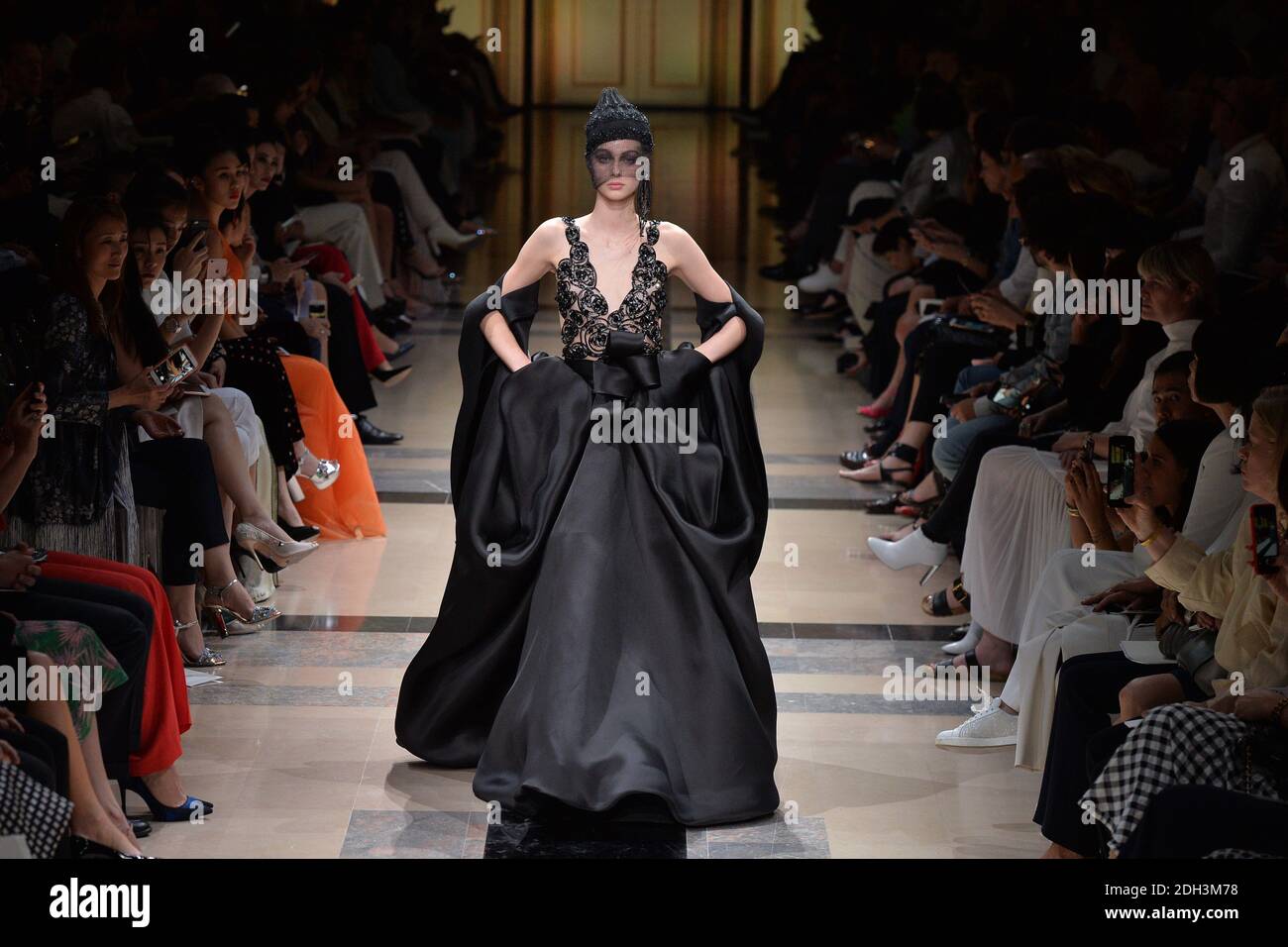 A model displays a creation designed by Giorgio Armani during the ...