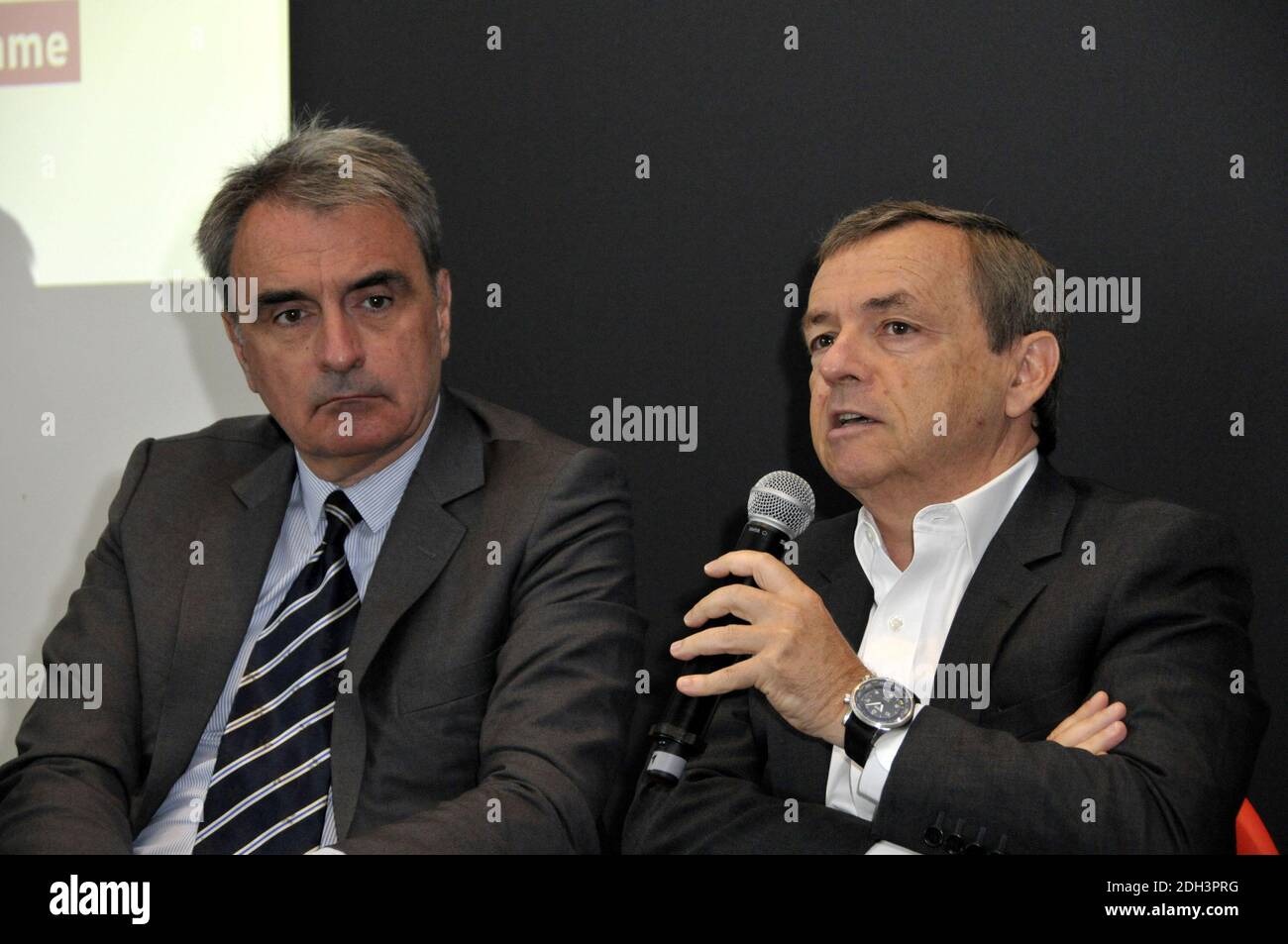General director of SFR telecom Michel Paulin and CEO of Nextradio ...
