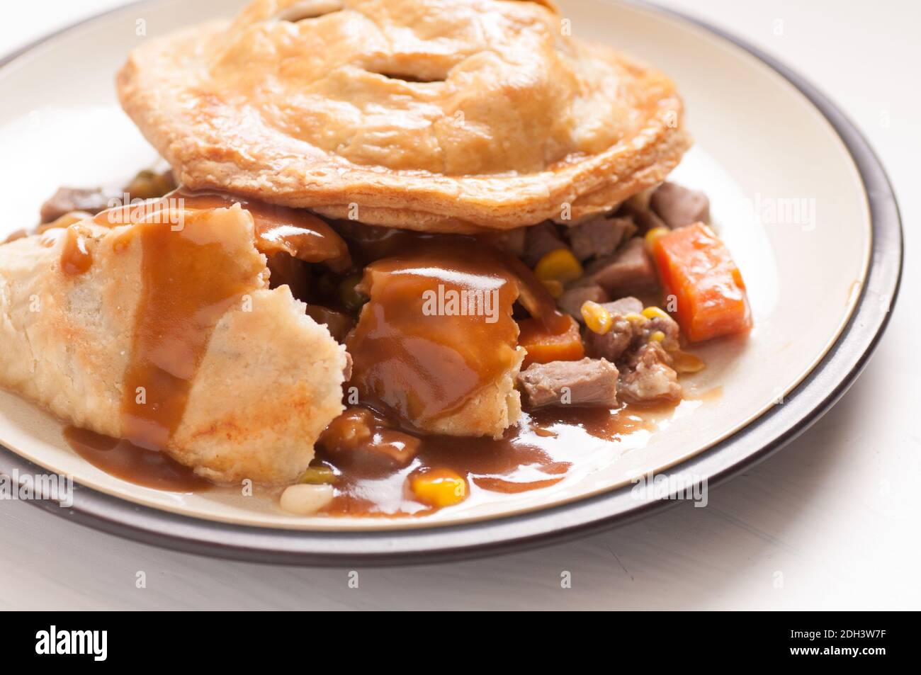 meat pie made with roast beef in a savoury gravy Stock Photo - Alamy