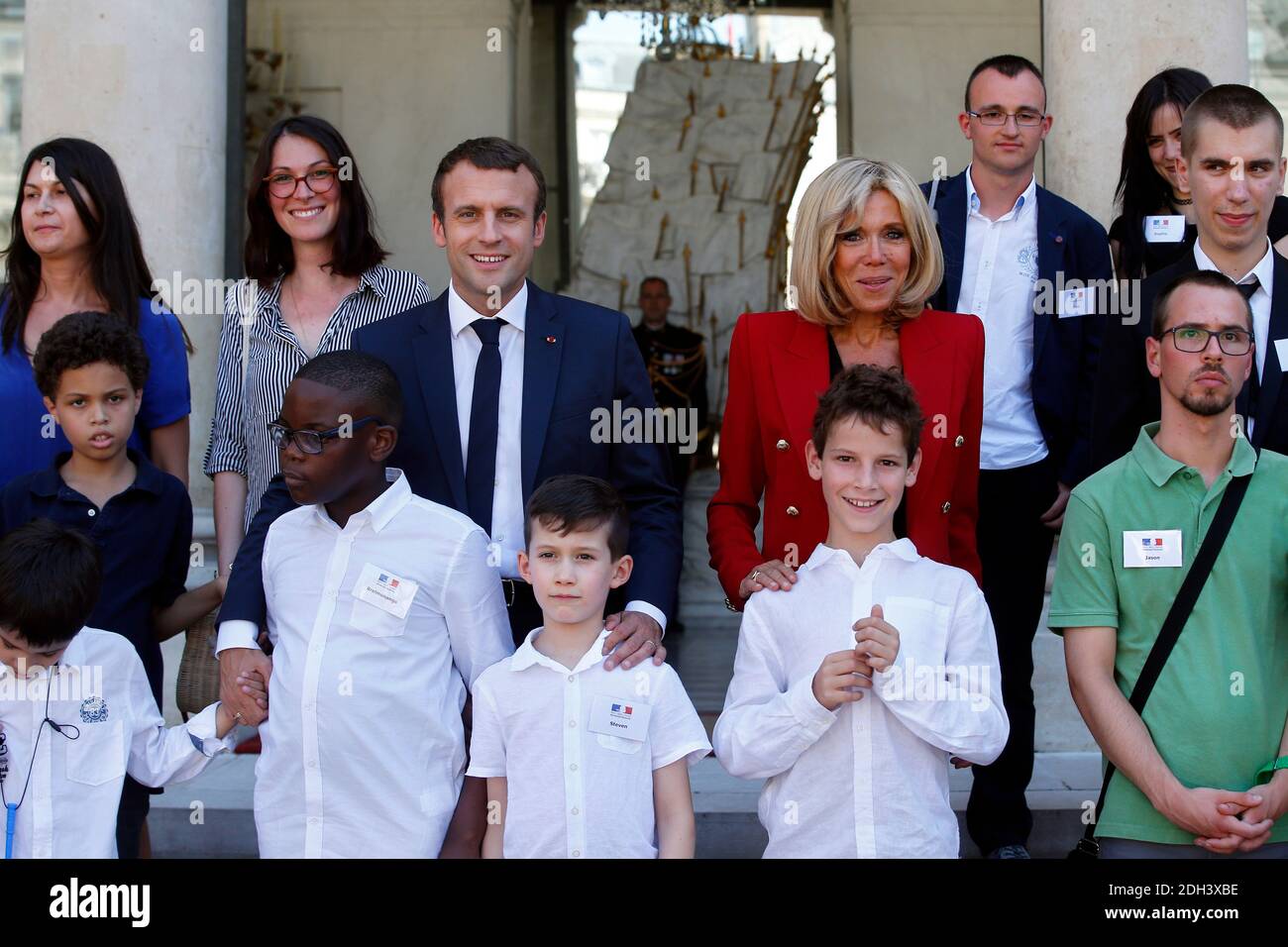 France's President Emmanuel Macron, center left, and his wife Brigitte ...
