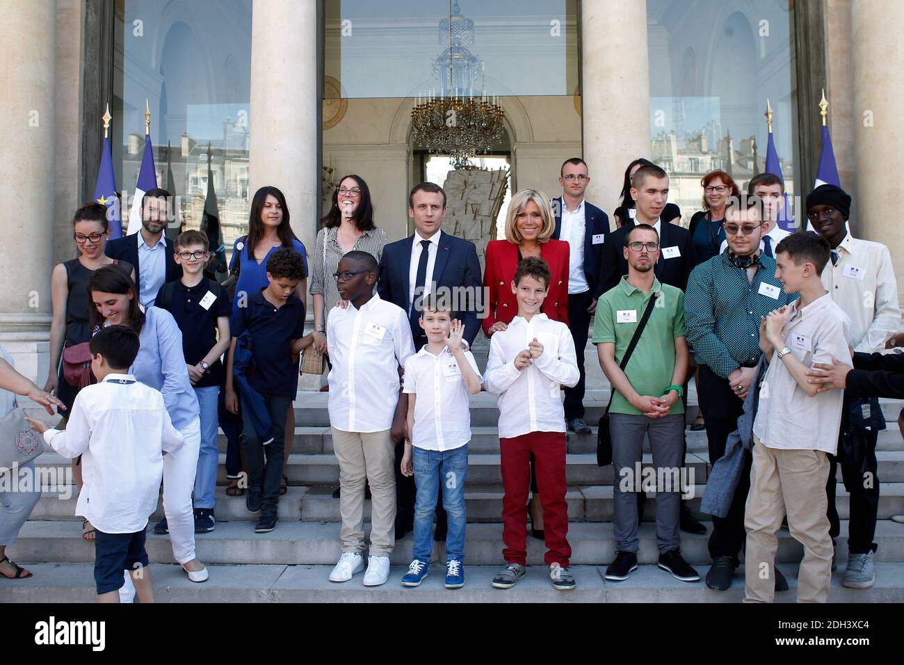 France's President Emmanuel Macron, center left, and his wife Brigitte ...