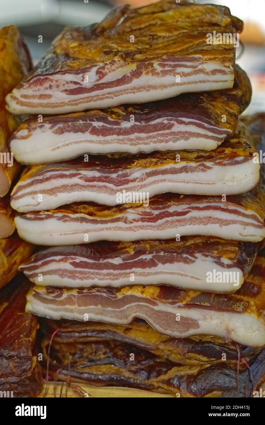 Many slabs of bacon pork meat stack Stock Photo - Alamy