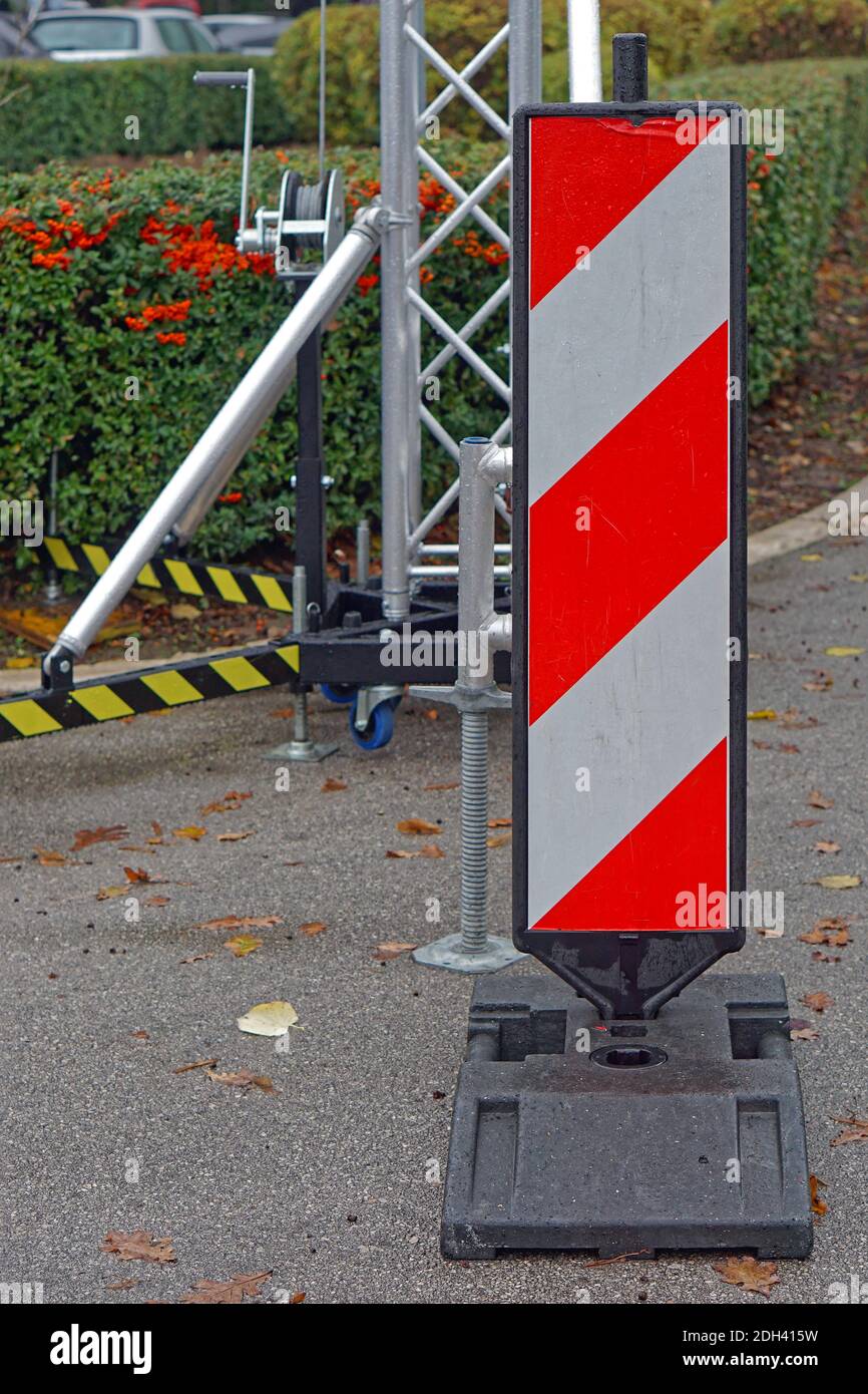 Red and white stripped caution warning sign Stock Photo - Alamy