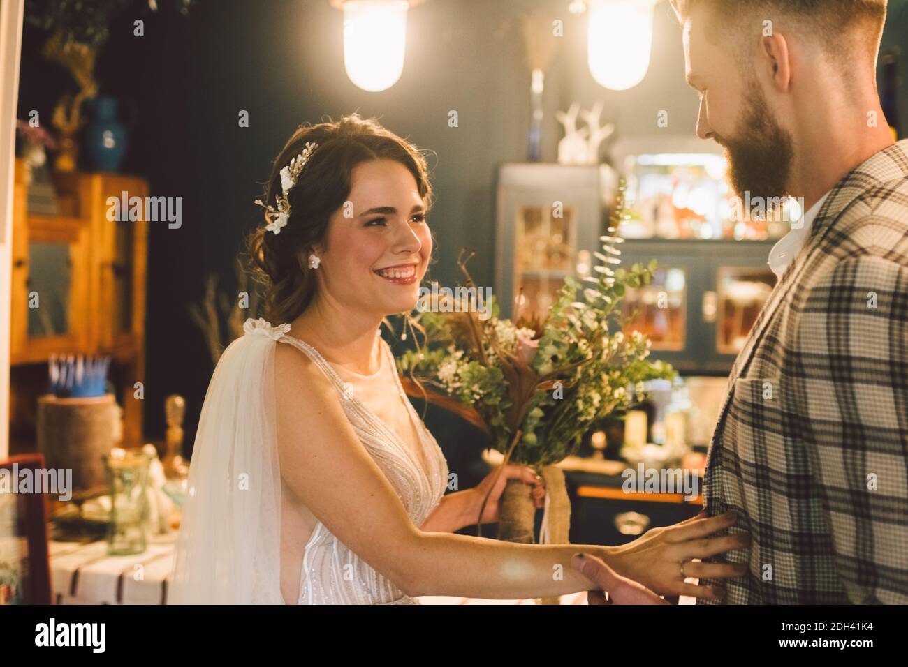 First look moment at wedding before ceremony starts. Bride and groom ...