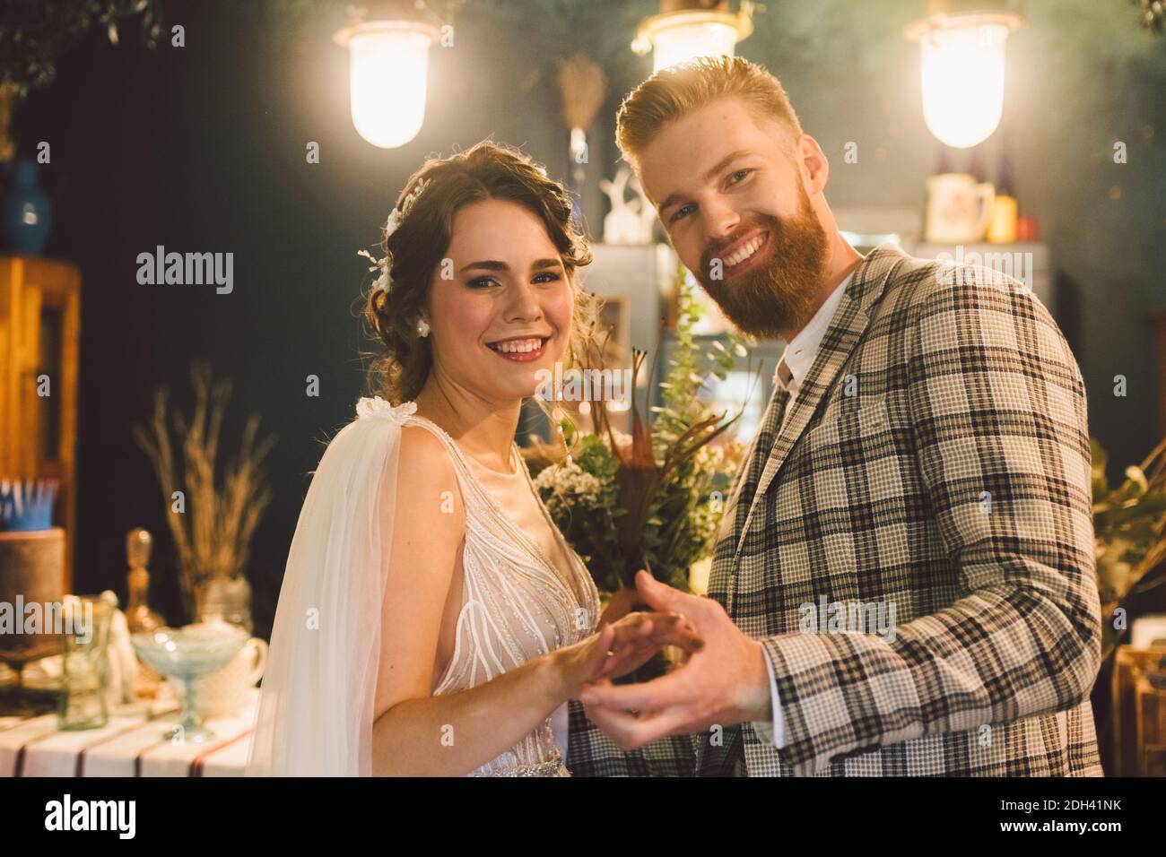 First look moment at wedding before ceremony starts. Bride and groom ...