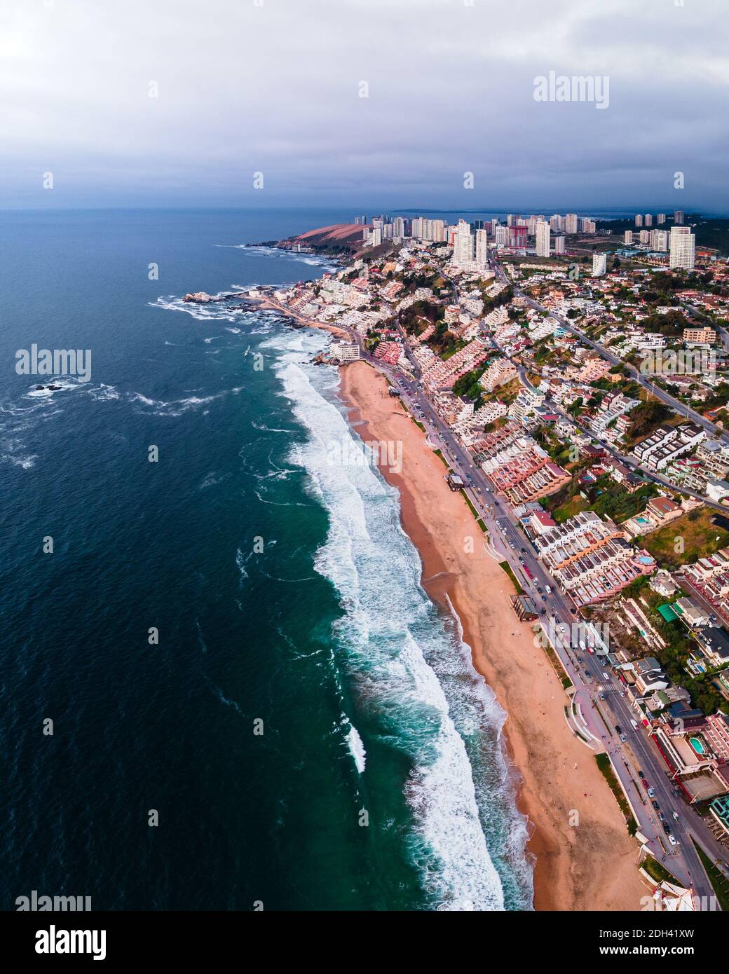 Aerial overview of Renaca beach in Chile on a cloudy with its coastline ...