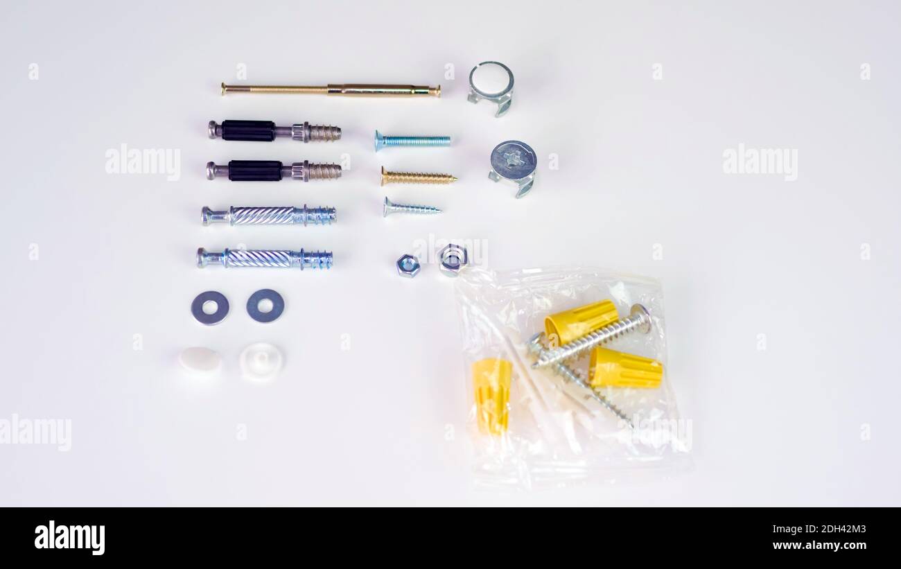 Accessories for assembling furniture.A set of furniture bolts and ...