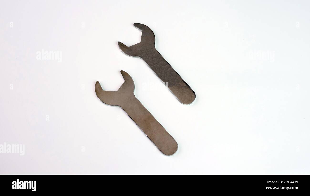 Wrenches on a white background, mini wrenches top view Stock Photo - Alamy