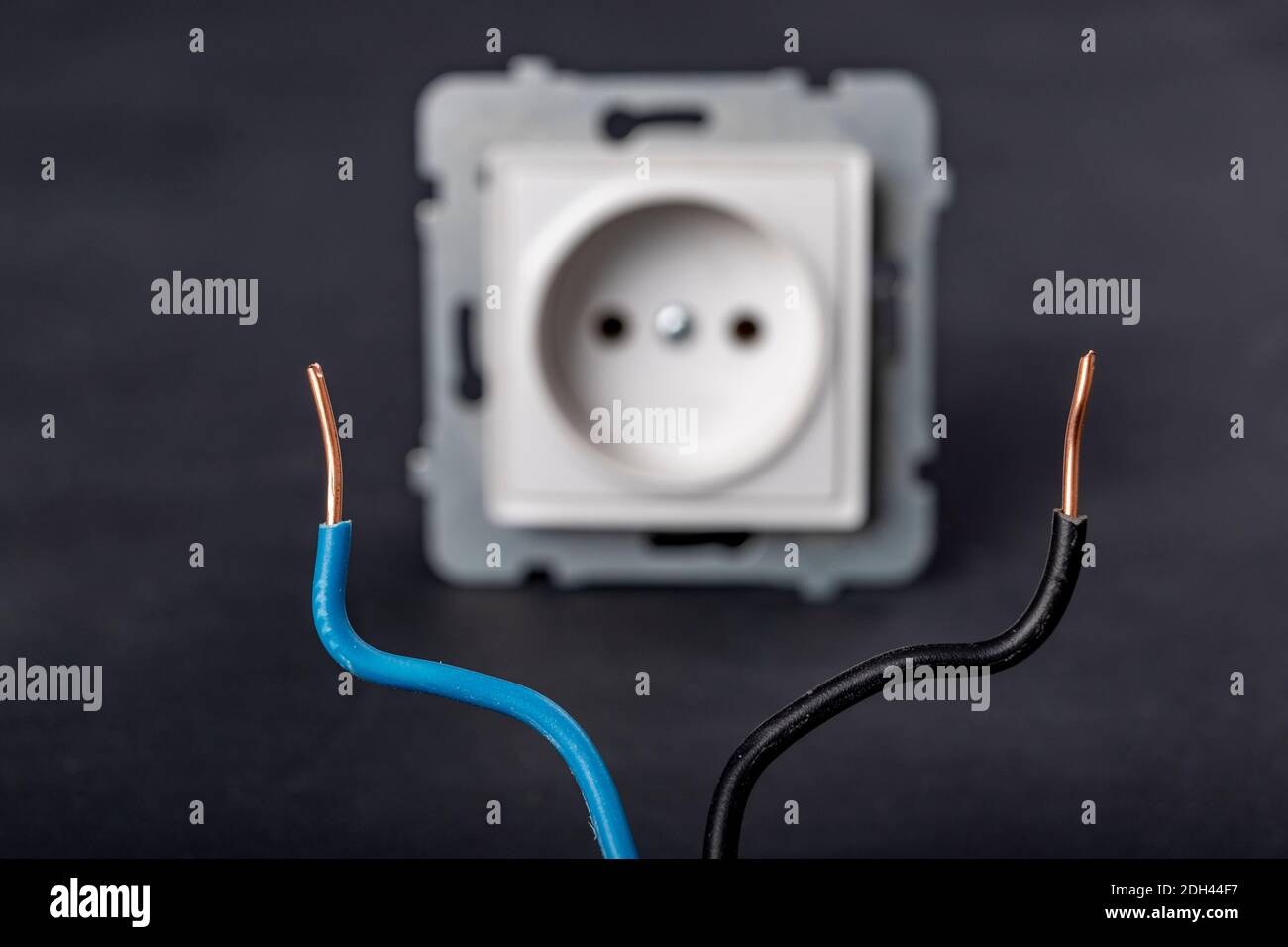 Copper wires and electrical outlet. Minor electrical work in the ...