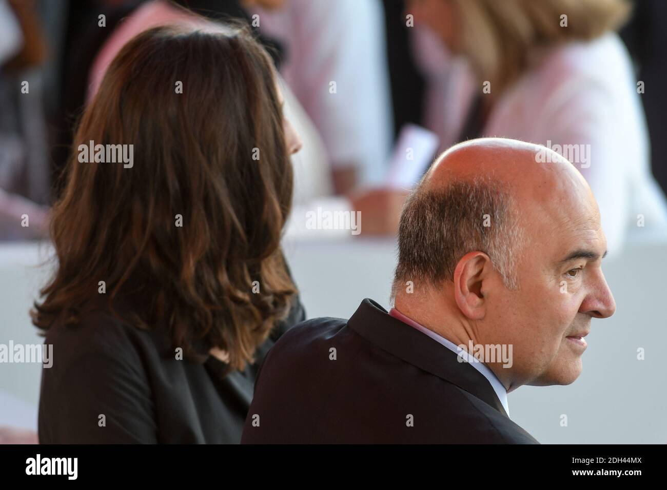 Pierre Moscovici and wife Anne-Michelle Basteri attends Bastille Day ...