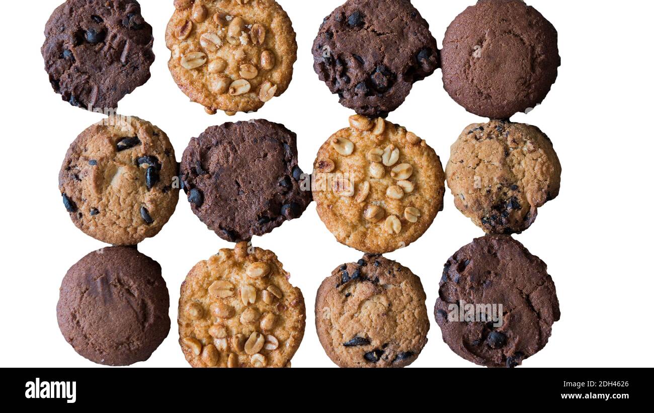 Biscuits of different types and flavors on an isolated white background ...
