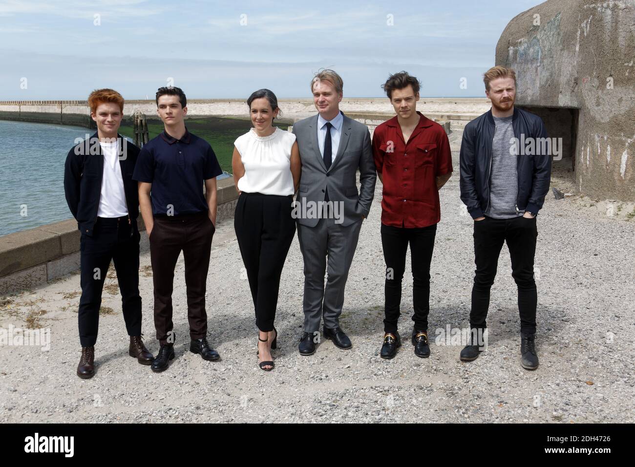 L-R: Tom Glynn-Carney, Fionn Whitehead, producer Emma Thomas ...