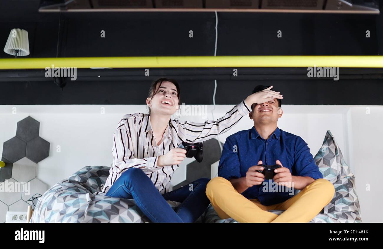 Workers Playing computer games Stock Photo - Alamy