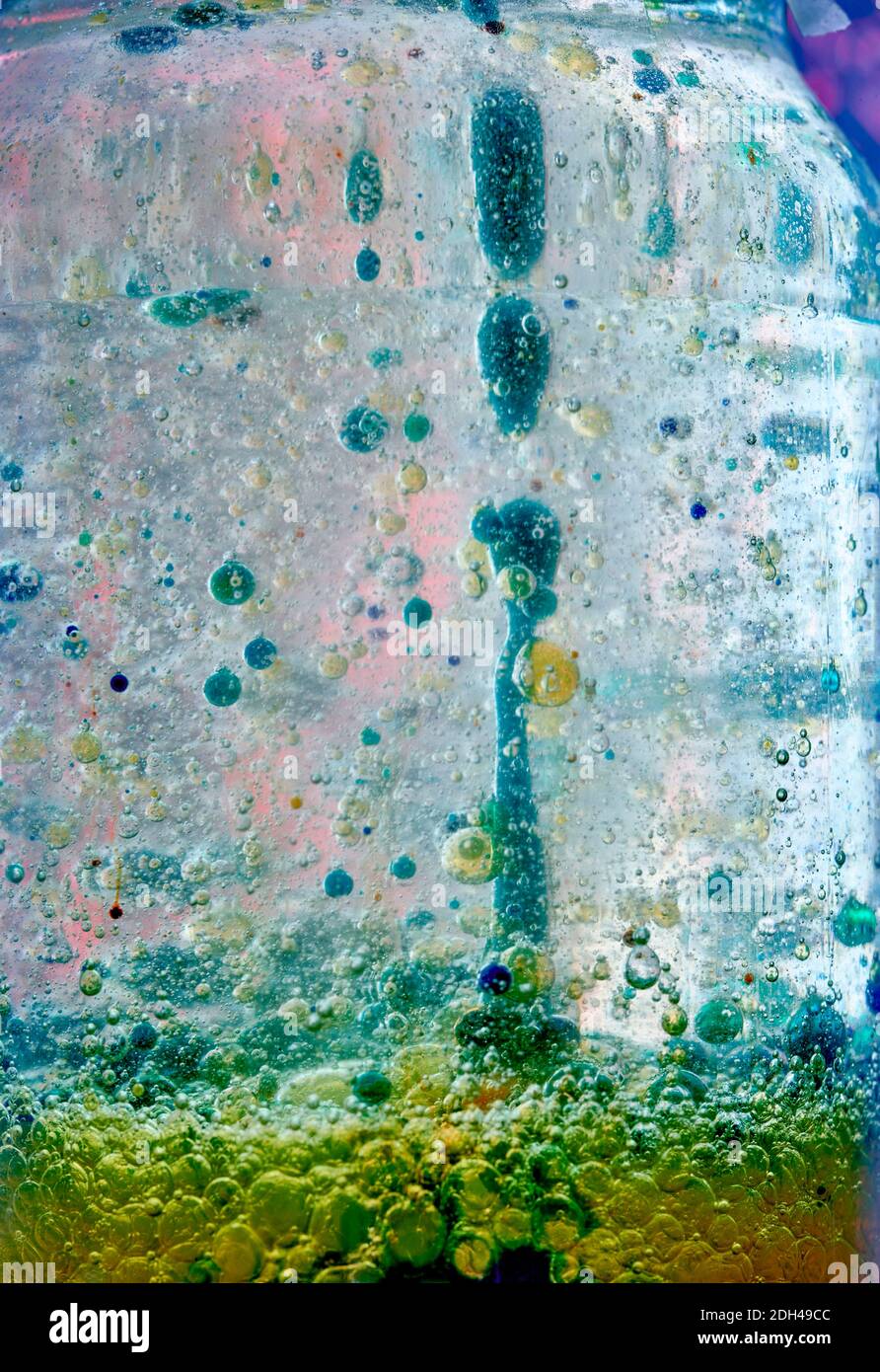 Bubbles forming textured colourful background formed by a simple ...