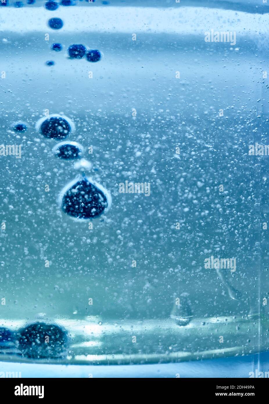 Bubbles forming textured colourful background formed by a simple ...