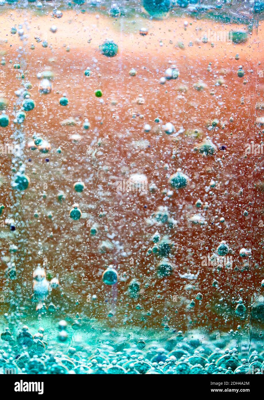 Bubbles forming textured colourful background formed by a simple ...
